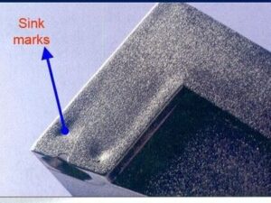 How to avoid sink marks in injection molding?